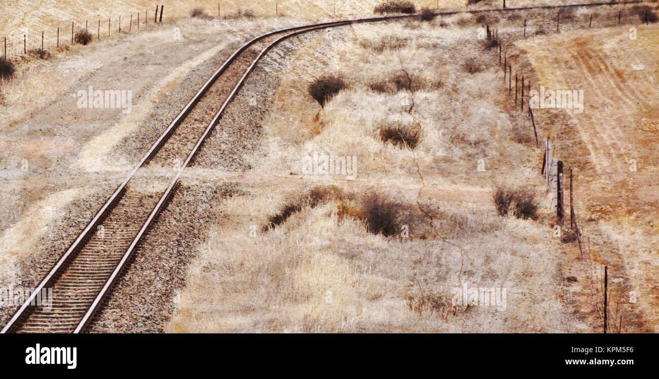 Landscape with dry farm land and a railway line Stock Photo - Alamy