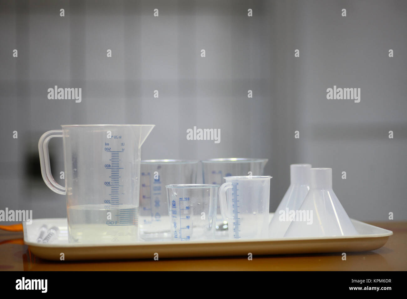 Recipients in chemistry lab Stock Photo - Alamy
