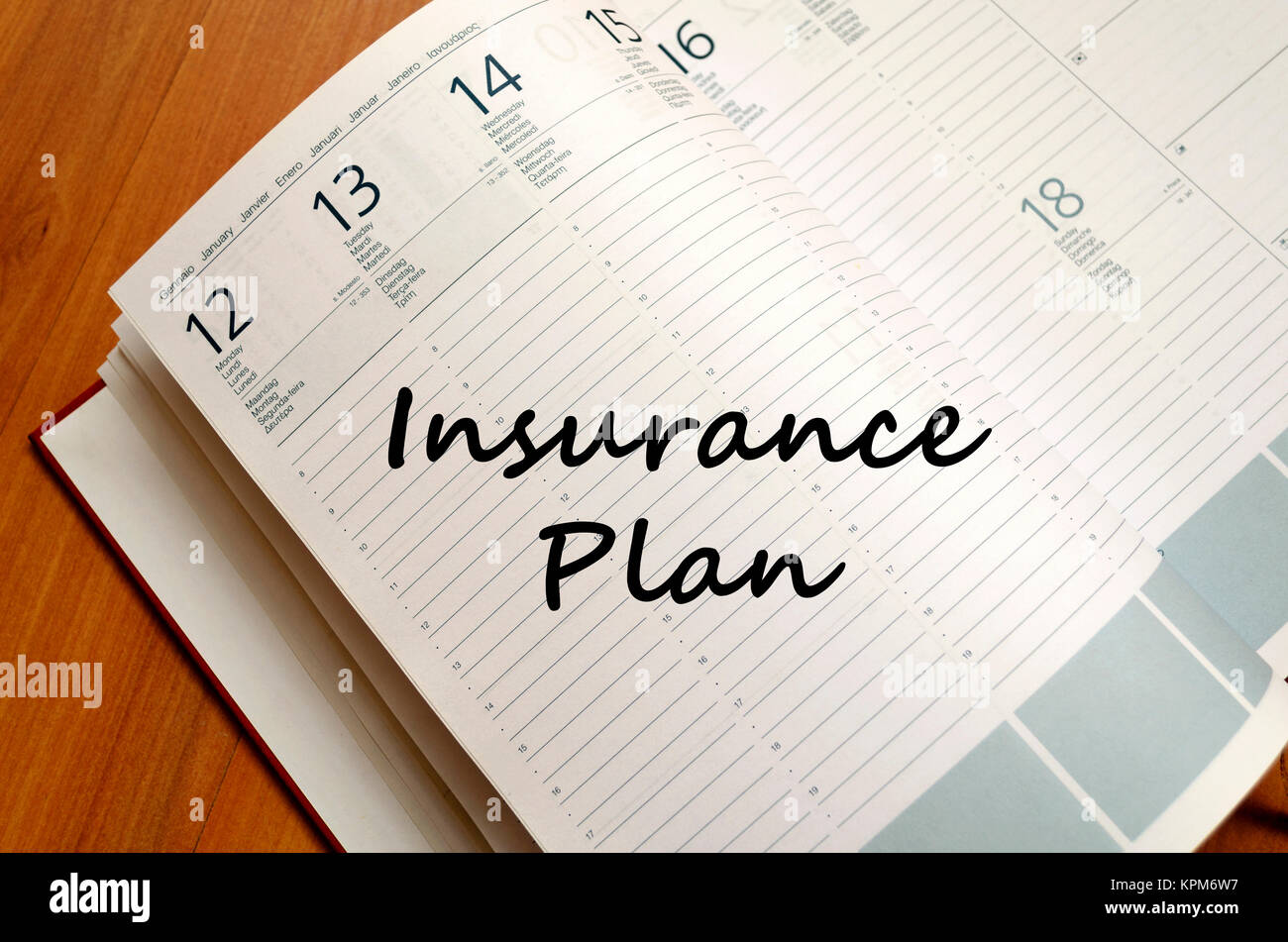 Insurance plan write on notebook Stock Photo - Alamy