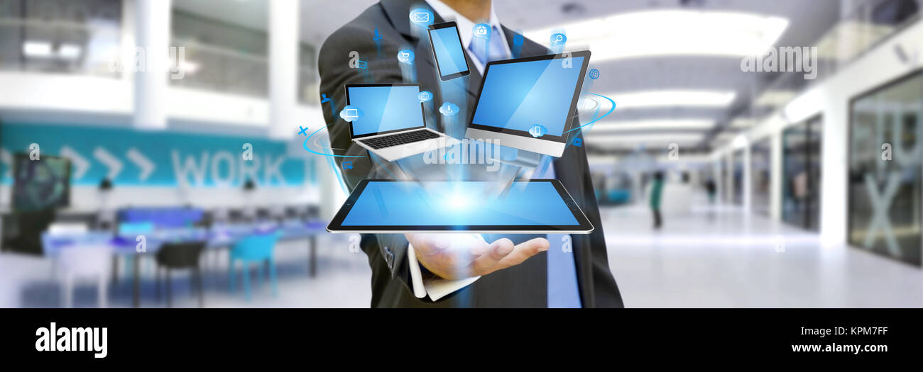 Businessman holding tech device in his hand Stock Photo - Alamy