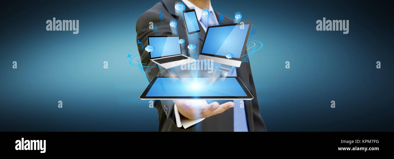 Businessman holding tech device in his hand Stock Photo - Alamy