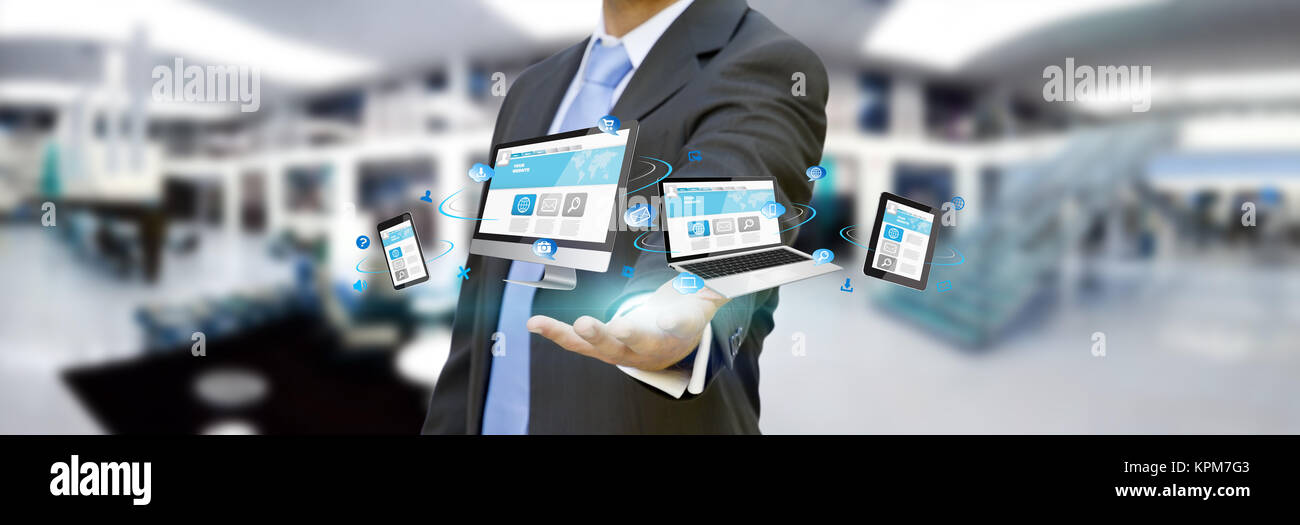 Businessman in his office using tactile interface Stock Photo - Alamy