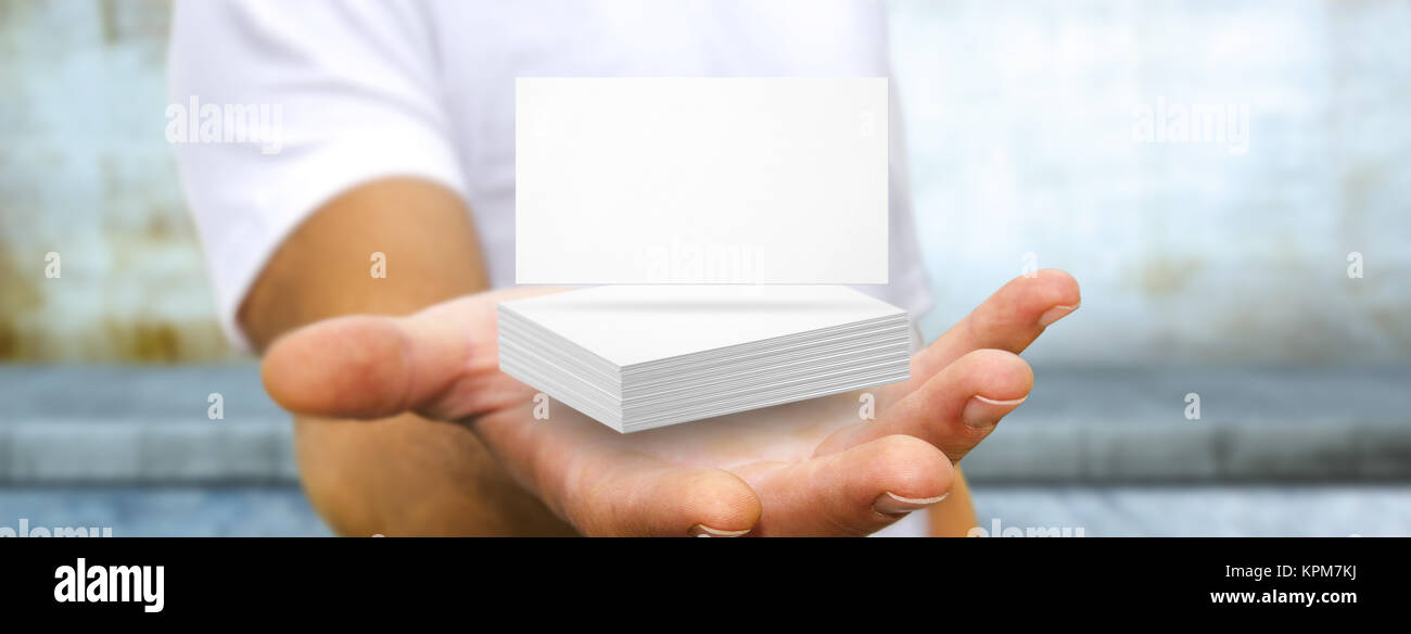 Businessman holding business card Stock Photo - Alamy Businessman holding business card Stock Photo - Alamy
