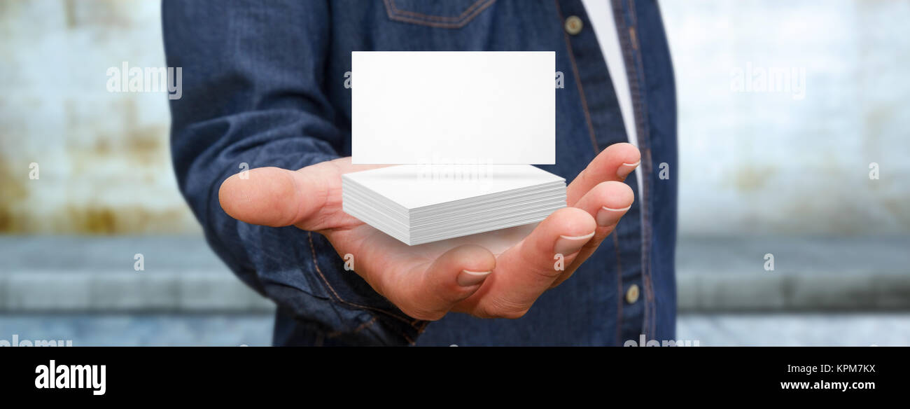 Businessman holding business card Stock Photo - Alamy Businessman holding business card Stock Photo - Alamy