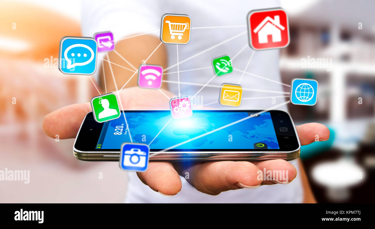 Young man using modern mobile phone Stock Photo - Alamy