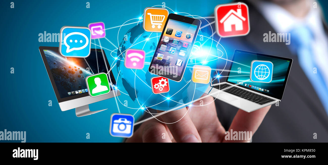 Businessman connecting tech devices Stock Photo - Alamy