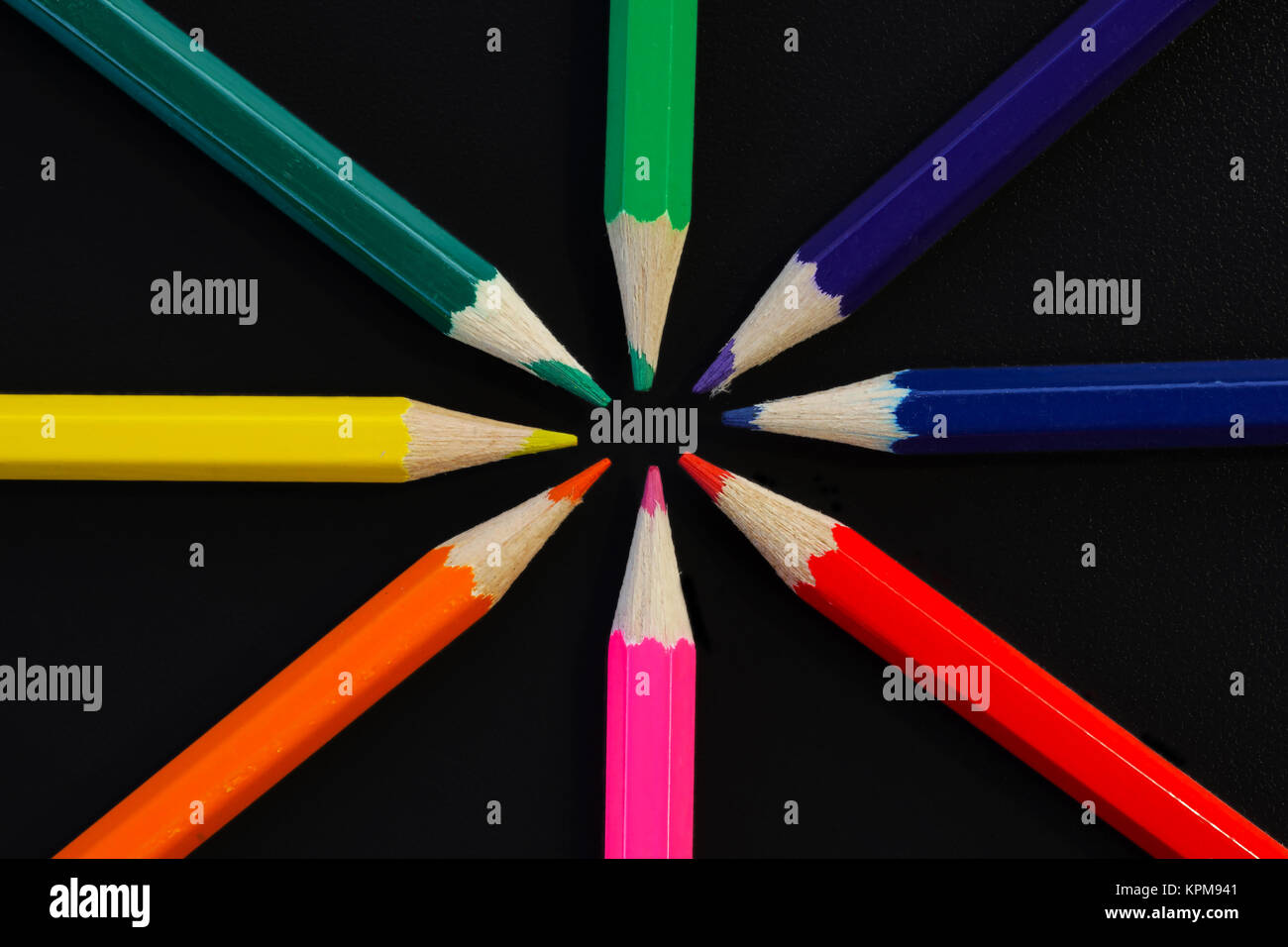 Collection of colored pencils on black background Stock Photo - Alamy