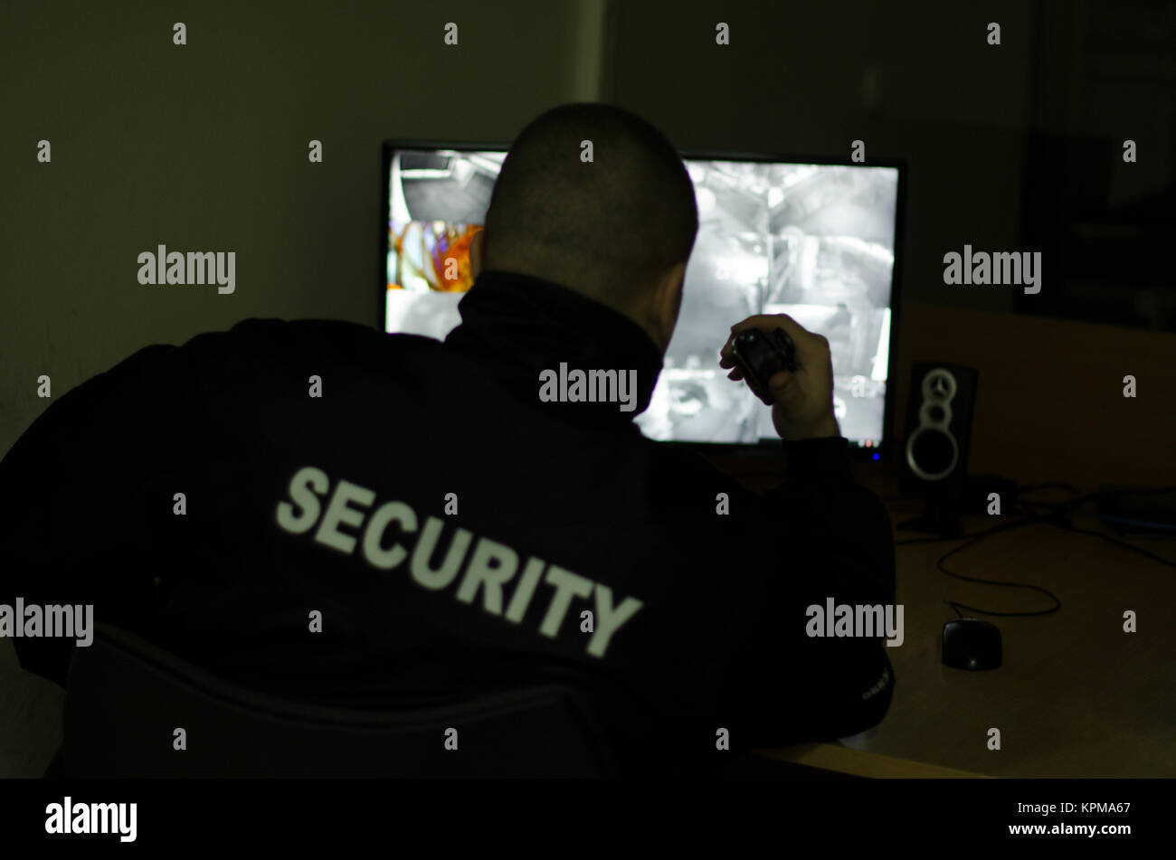 Black security officer hi-res stock photography and images - Alamy