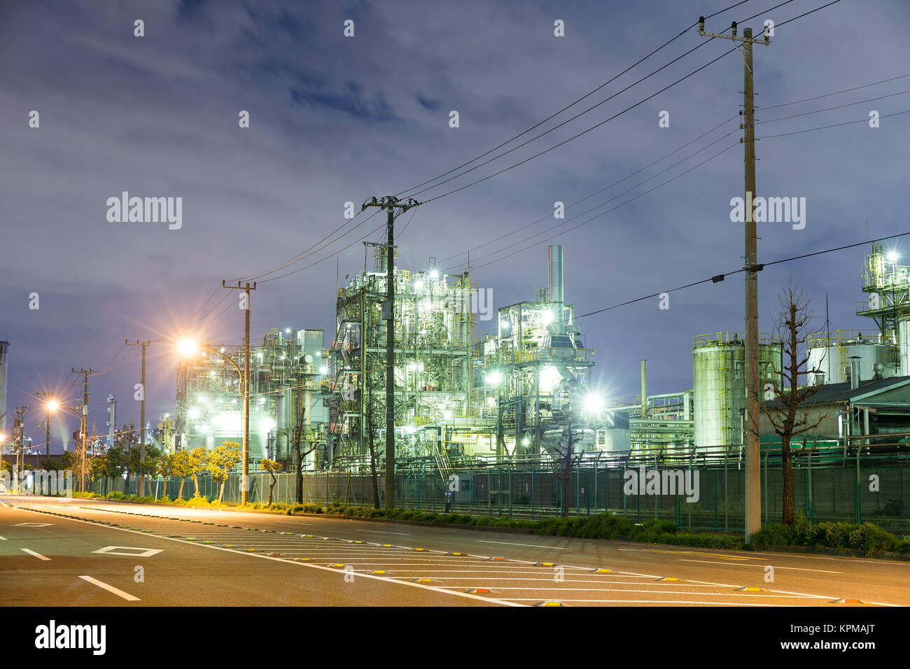Oil and gas refinery at night Stock Photo - Alamy