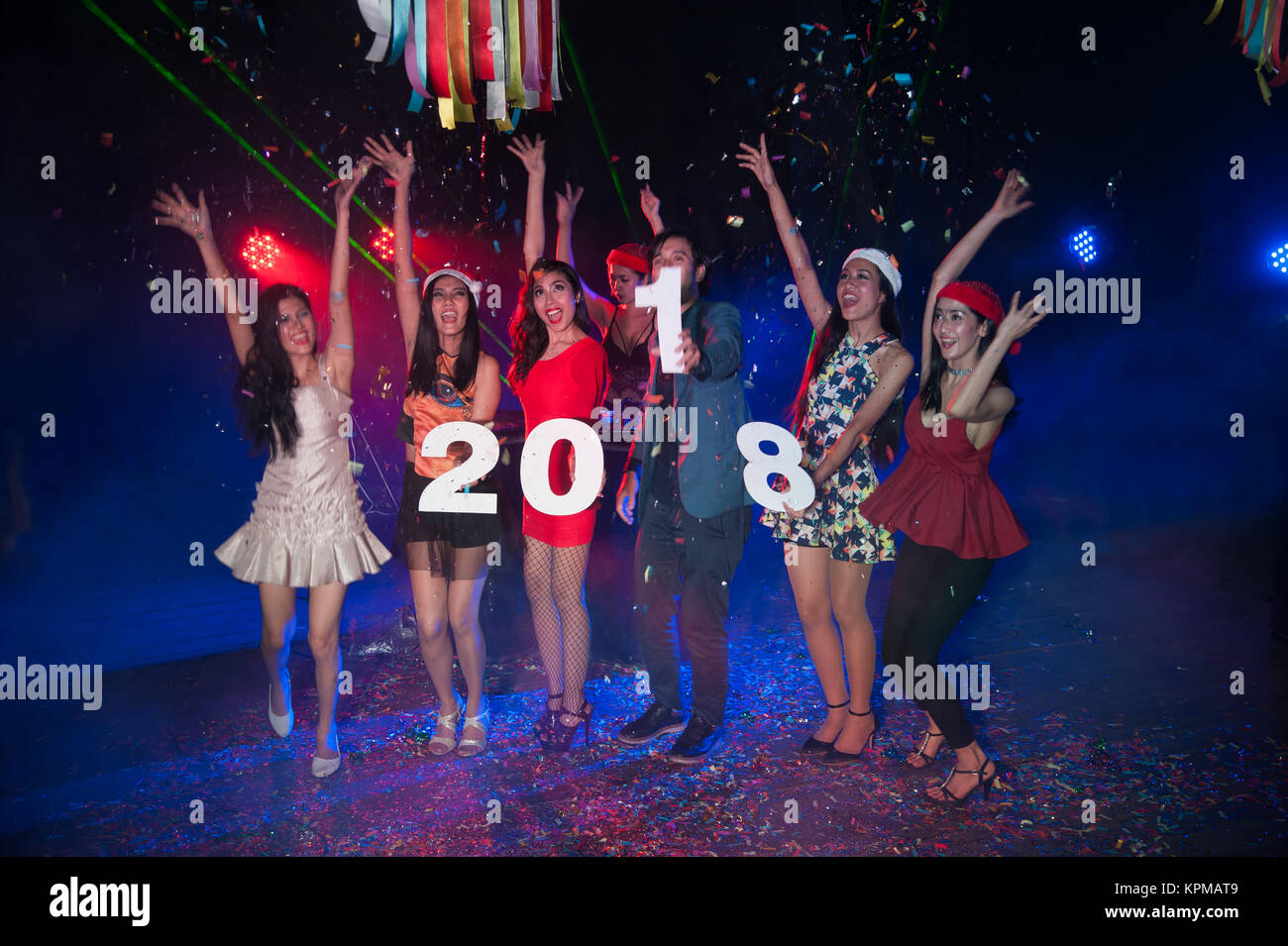 Group of people dancing at night club party and lights background Stock ...