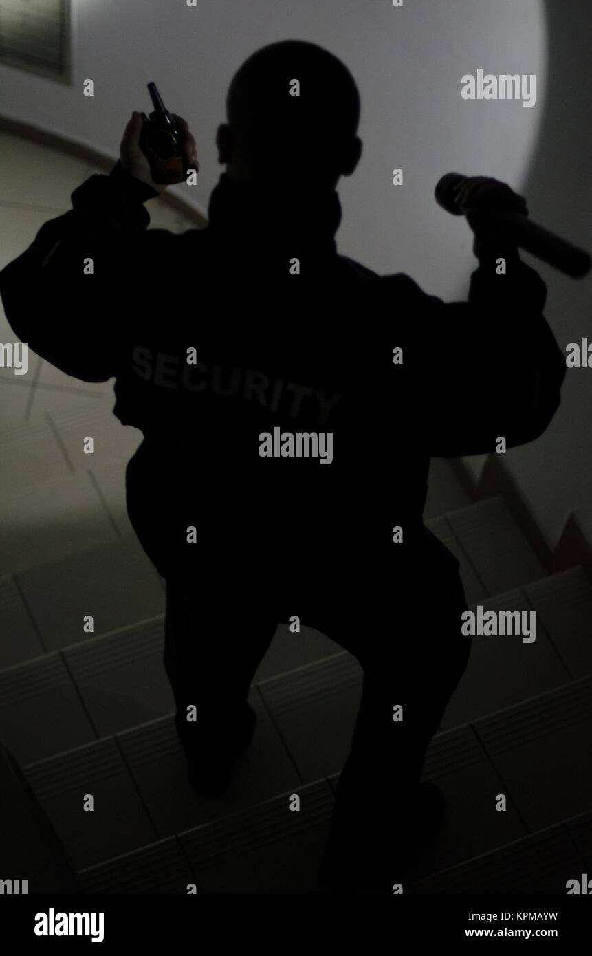 Night security officer silhouette hi-res stock photography and images ...