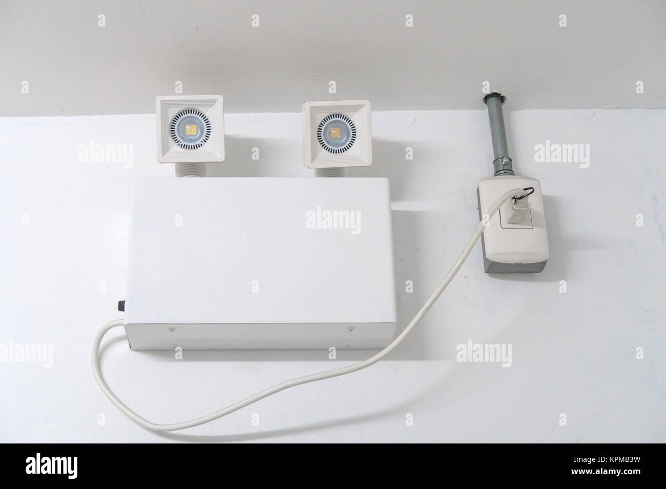 Light emergency on Wall the ceiling Plug Stock Photo - Alamy