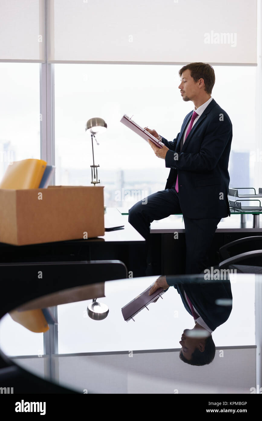 Just Hired Corporate Business Man Moves To New Office Stock Photo - Alamy