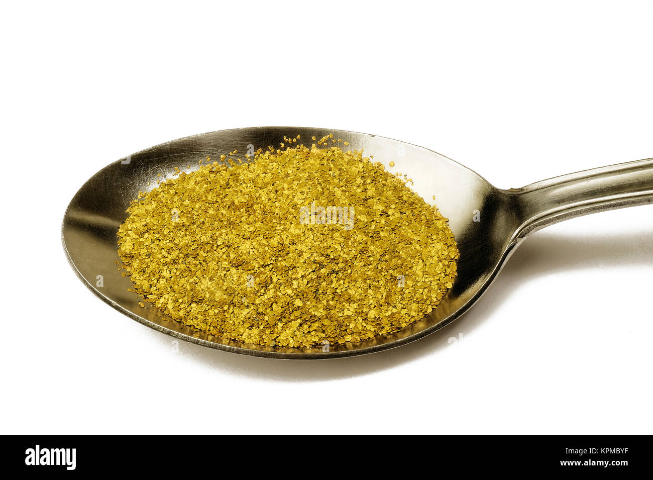 spoon with gold dust alluvial Stock Photo - Alamy