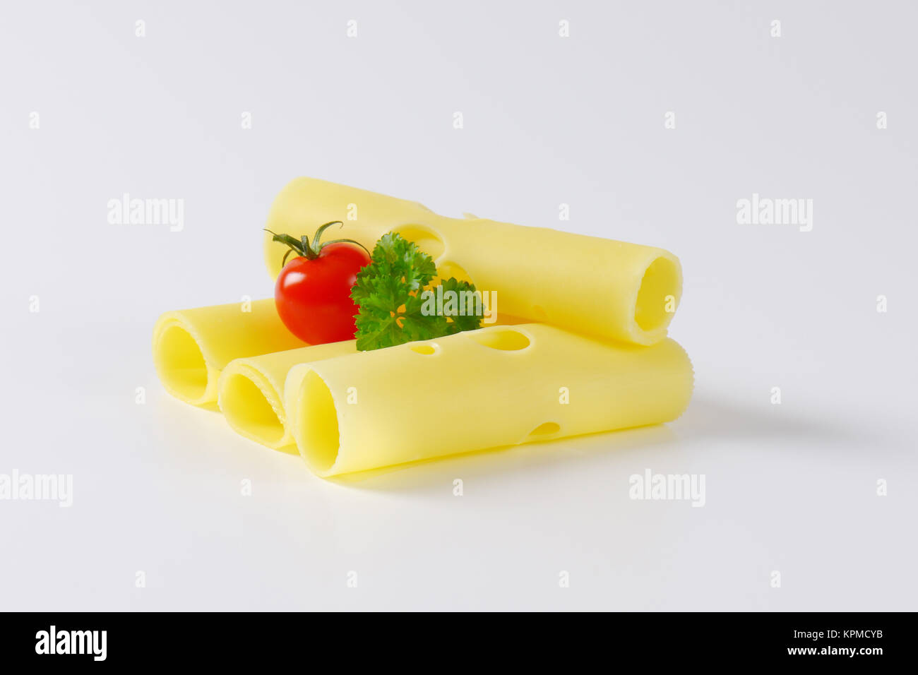 Swiss cheese slices Stock Photo - Alamy