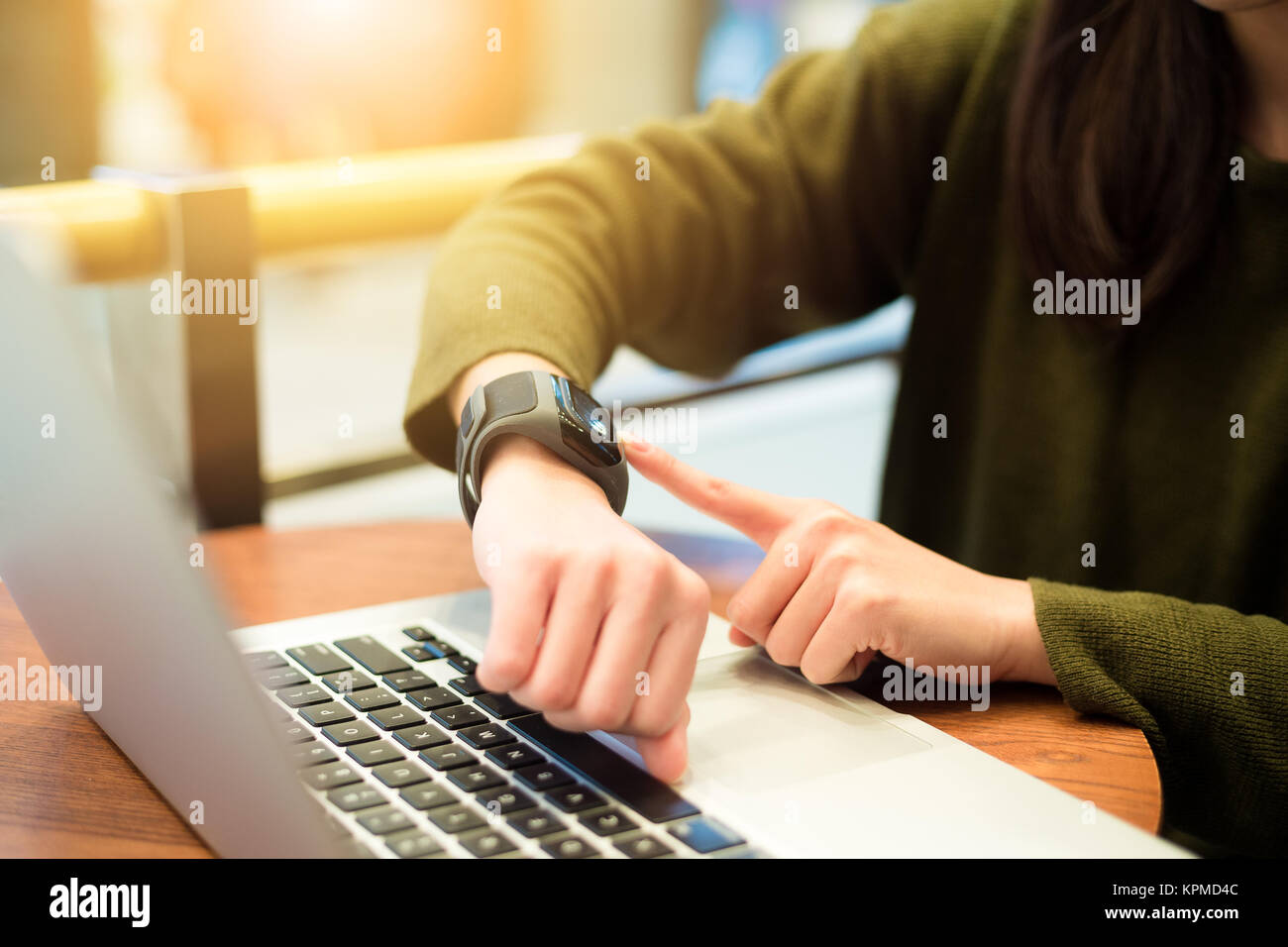 Woman connecting with laptop computer Stock Photo - Alamy