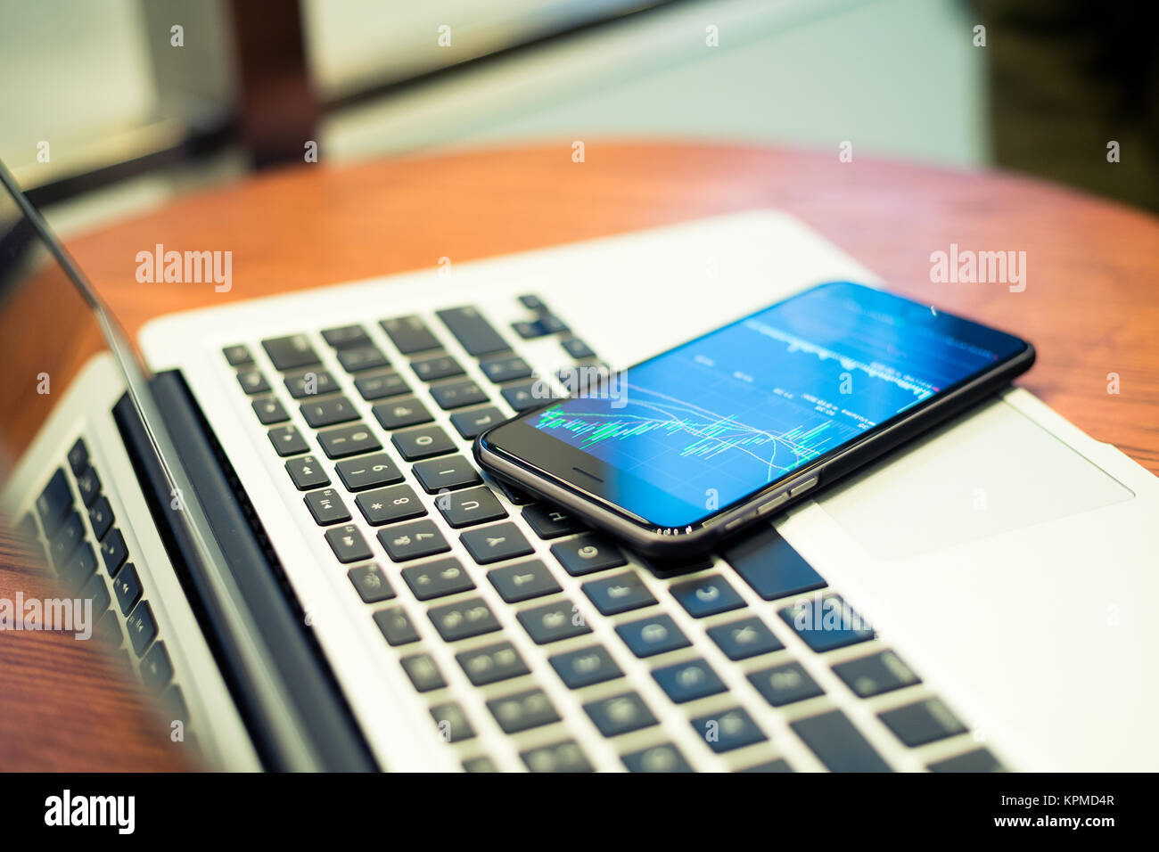 Stock market graph on cellphone Stock Photo - Alamy
