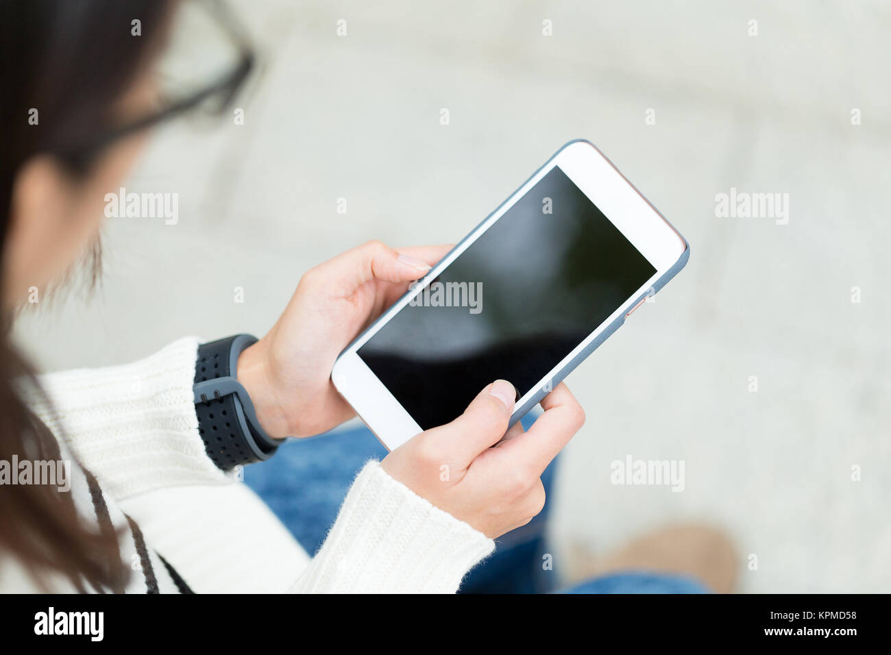 Top view of woman use of mobile phone Stock Photo - Alamy