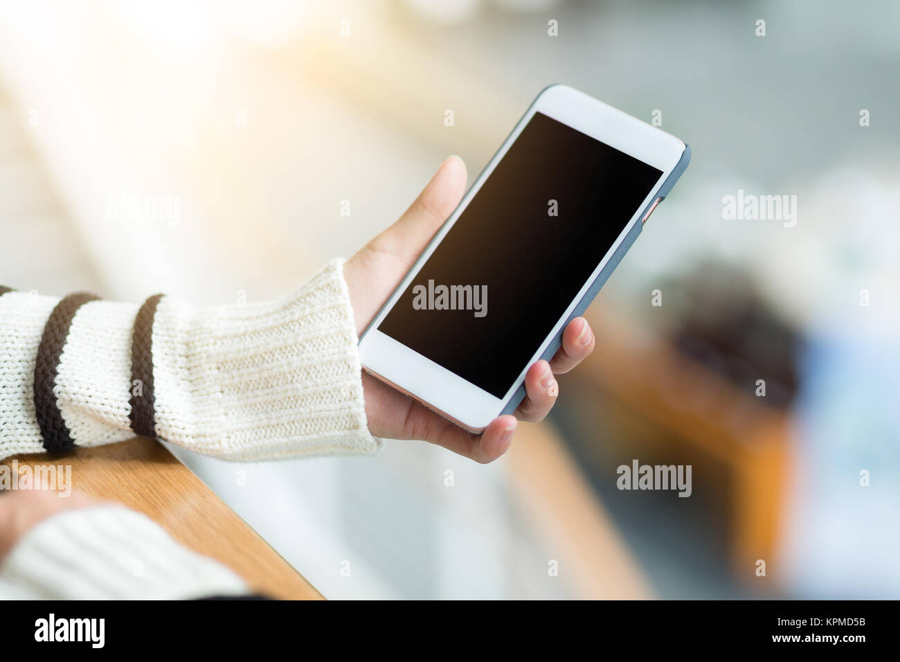 Woman hand hold with cellphone Stock Photo - Alamy
