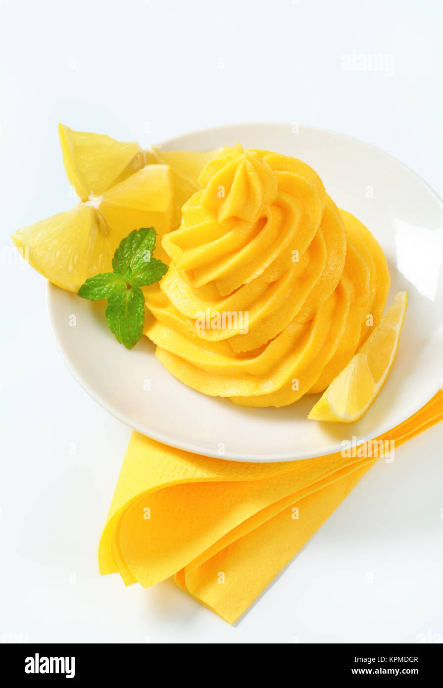 Swirl of lemon cream Stock Photo - Alamy