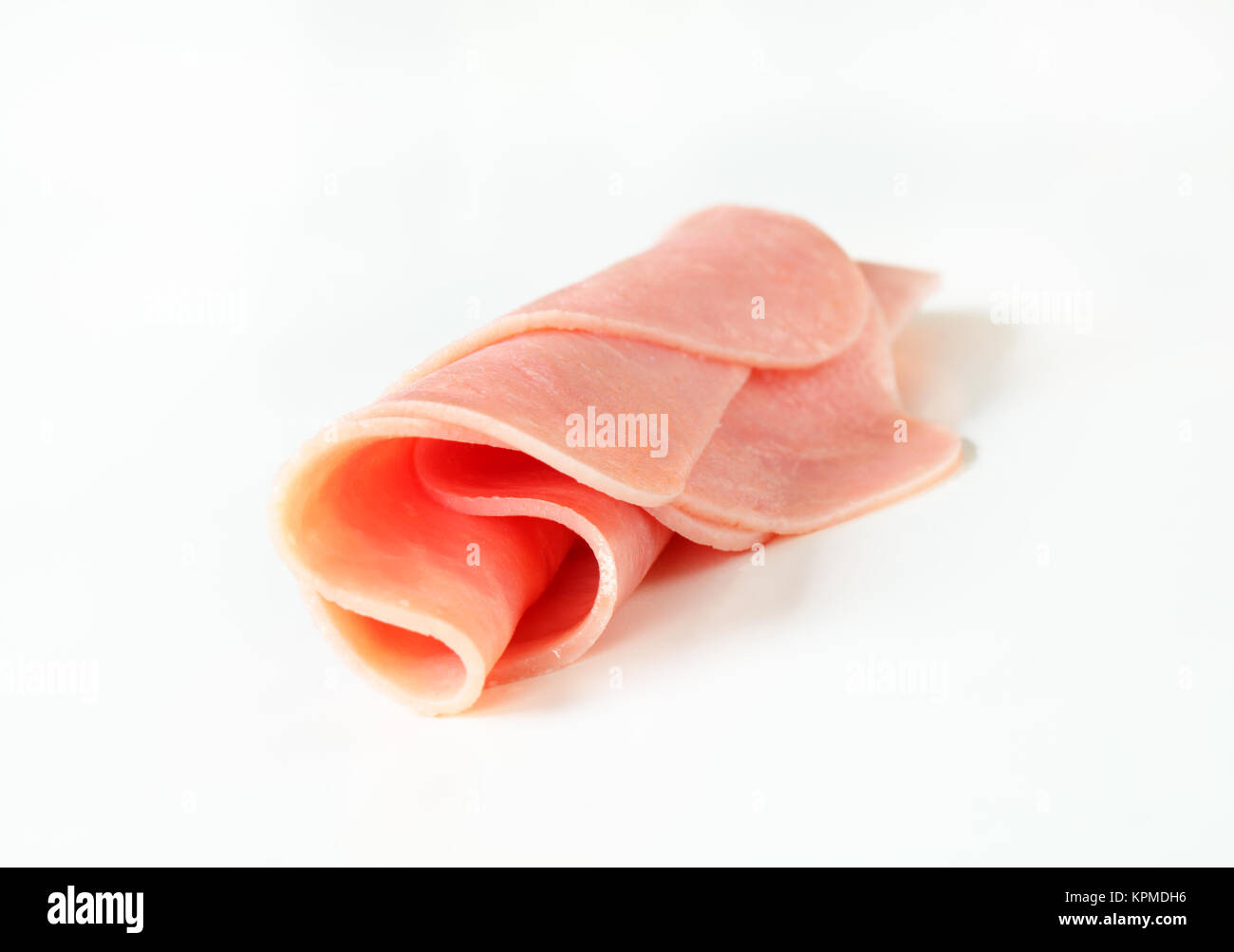 Thin slices of ham Stock Photo - Alamy