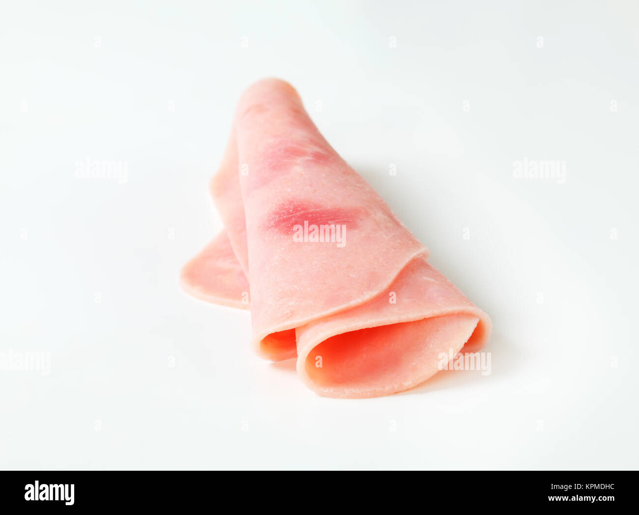 Thin slices of ham Stock Photo - Alamy