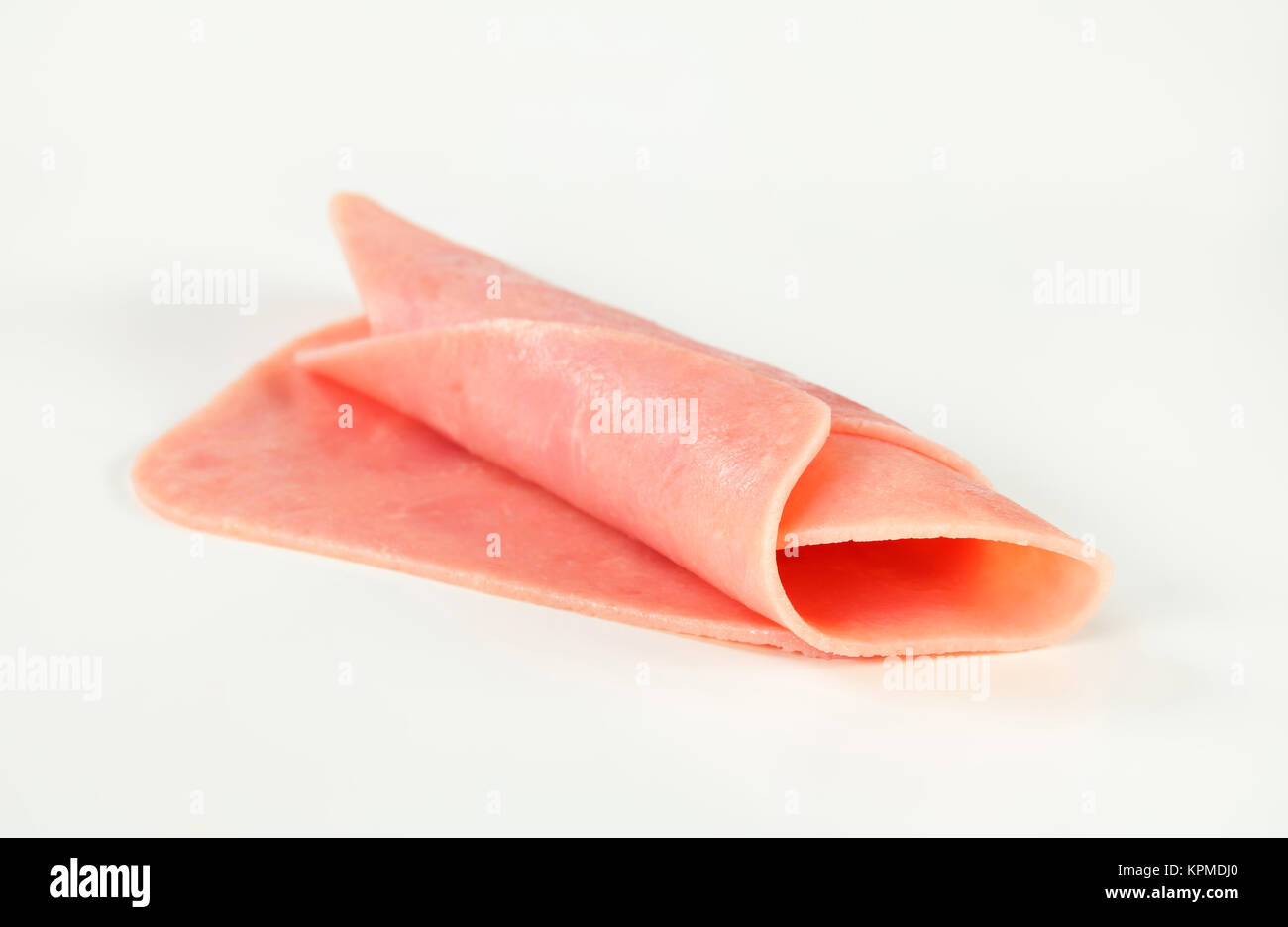 Thin slices of ham Stock Photo - Alamy