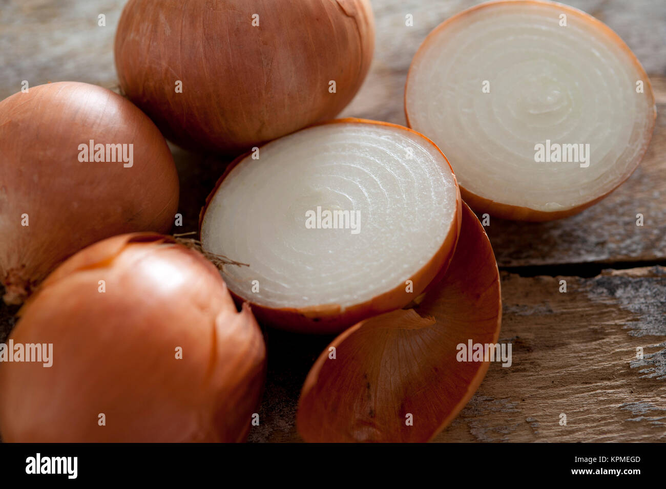 Close up of fresh spanish onion on rustic table Stock Photo - Alamy