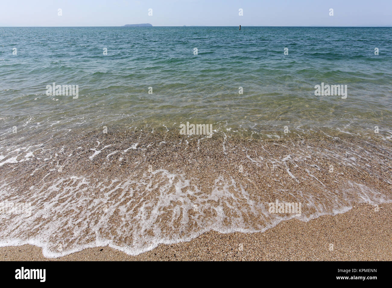 sea shallow landscape with ripple and blue sky Stock Photo - Alamy