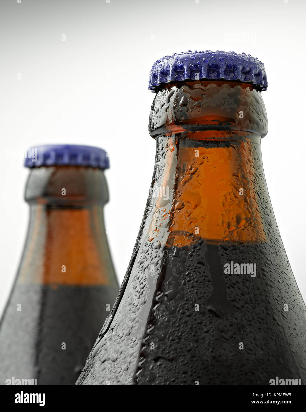 Beer bottle covered with water drops Stock Photo - Alamy