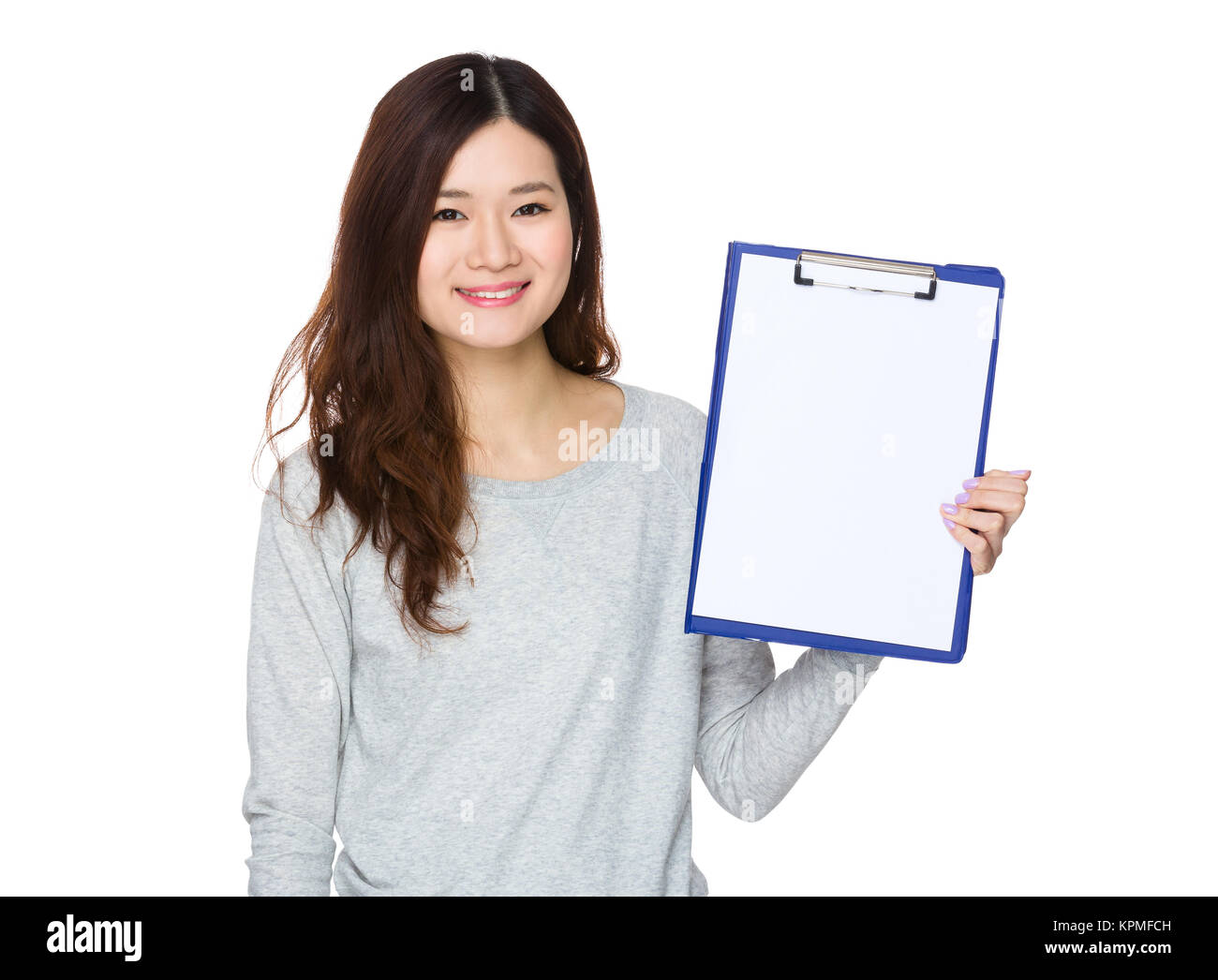 Woman show with clipboard Stock Photo - Alamy