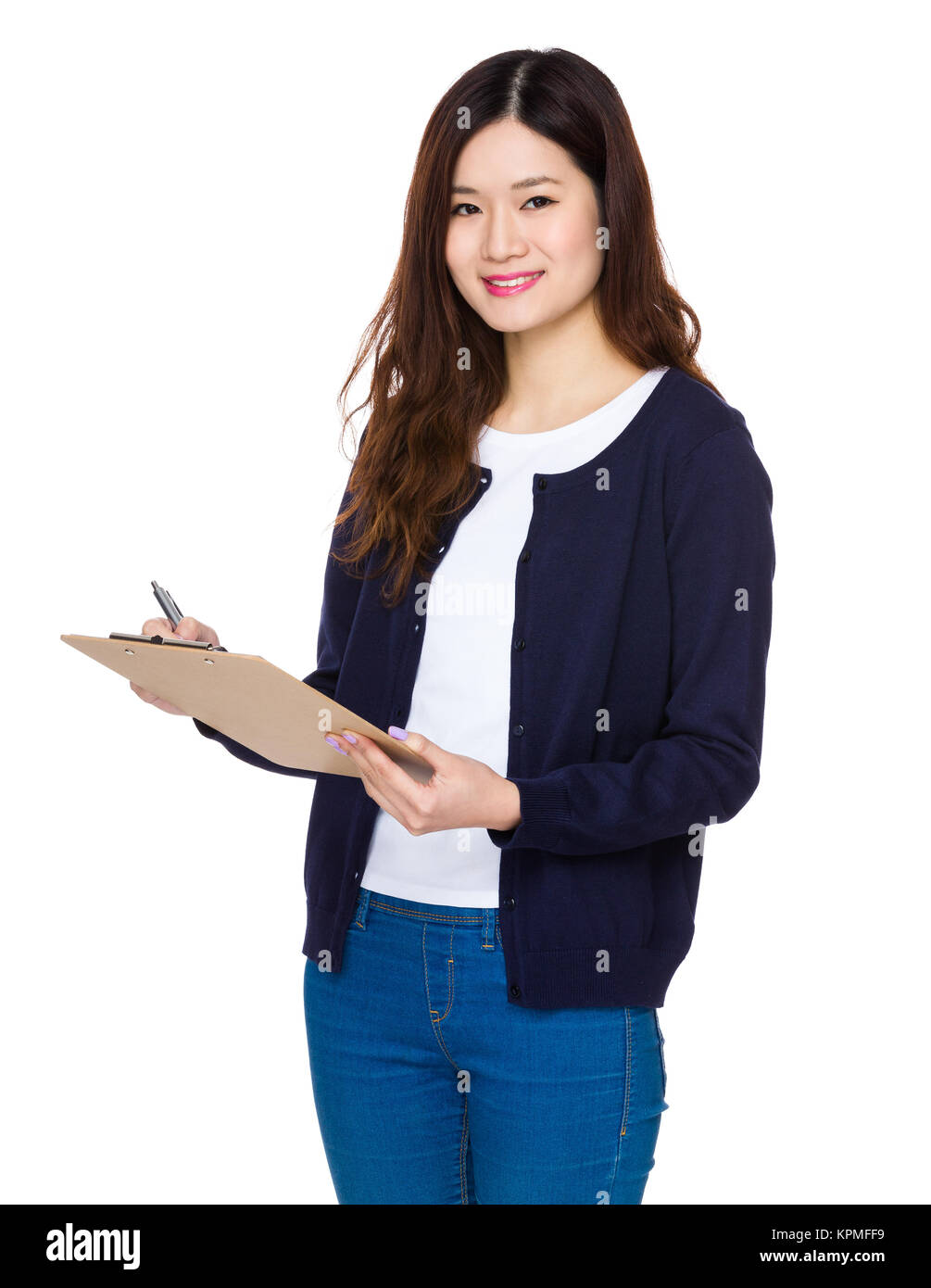 Woman take note on clipboard Stock Photo - Alamy