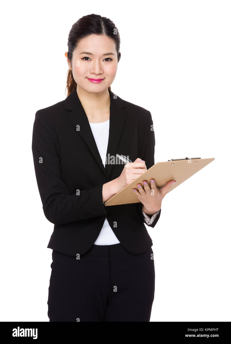 Young Businesswoman take note on clipboard Stock Photo - Alamy