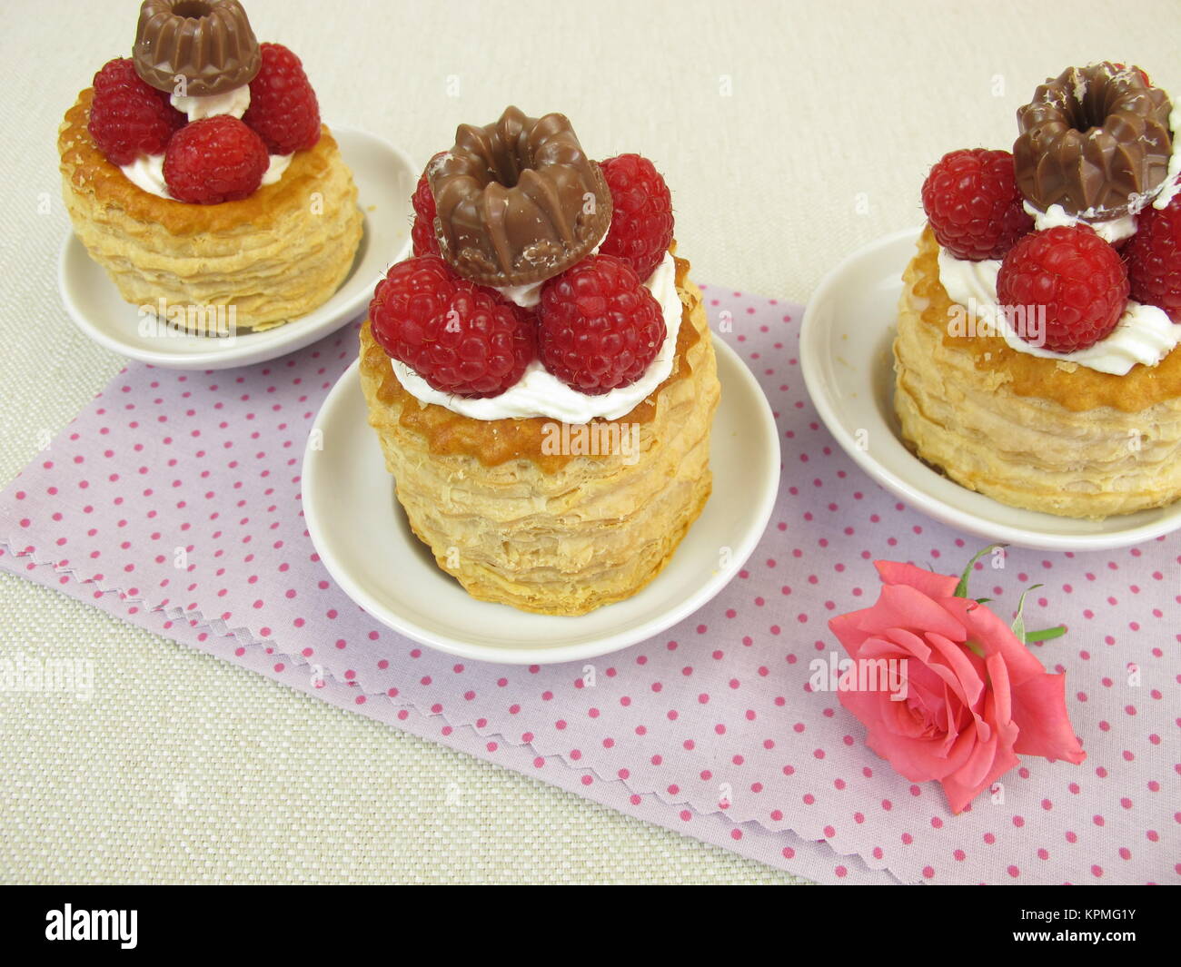 Sweet puff pastry pastetchen stuffed with raspberries,cream and ...