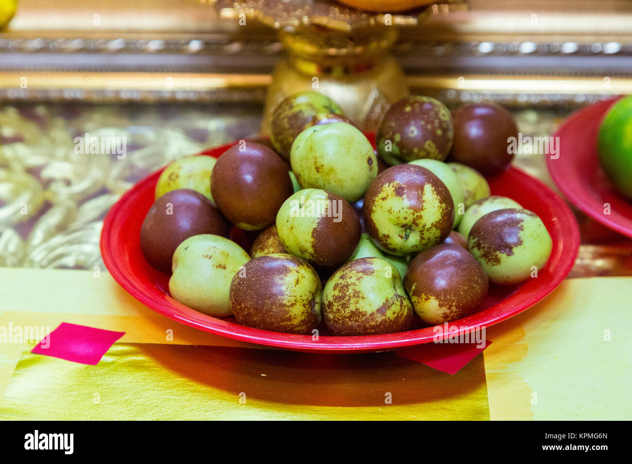Bangkok, Thailand. Monkey Apples (Annona glabra), Monkey King Shrine ...