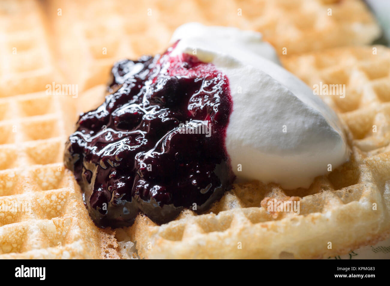 Waffle blueberry jam whipped cream hi-res stock photography and images ...