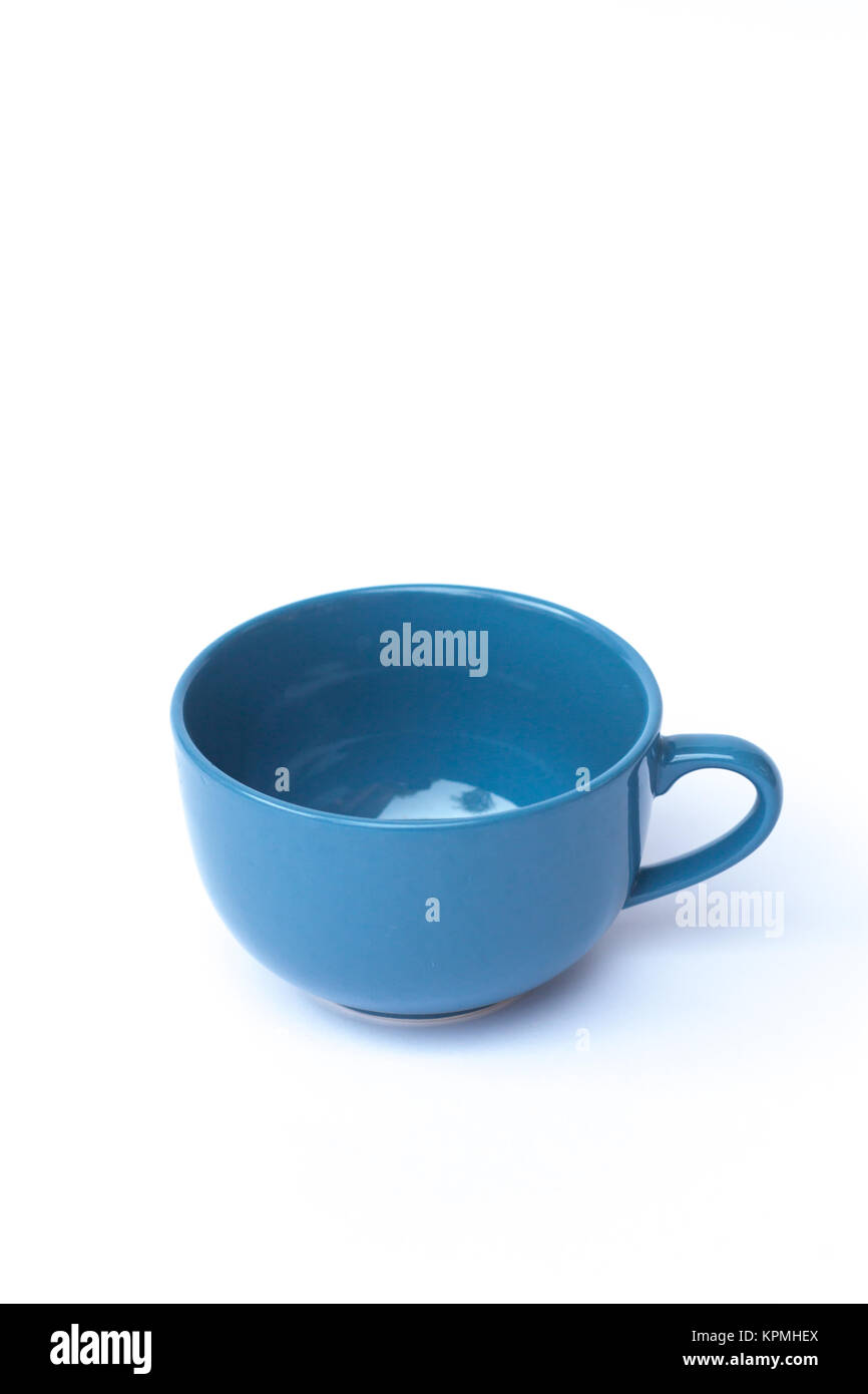 Blue ceramic bowl on white background Stock Photo - Alamy