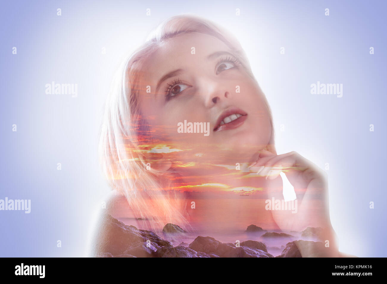 Beautiful young woman thinking of nature Stock Photo - Alamy