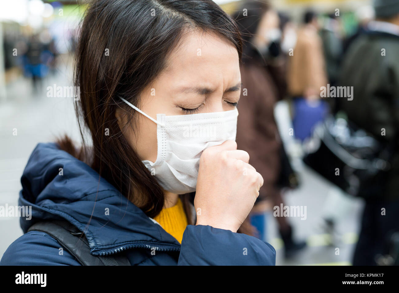 Woman suffer from sick in crowded of people Stock Photo - Alamy