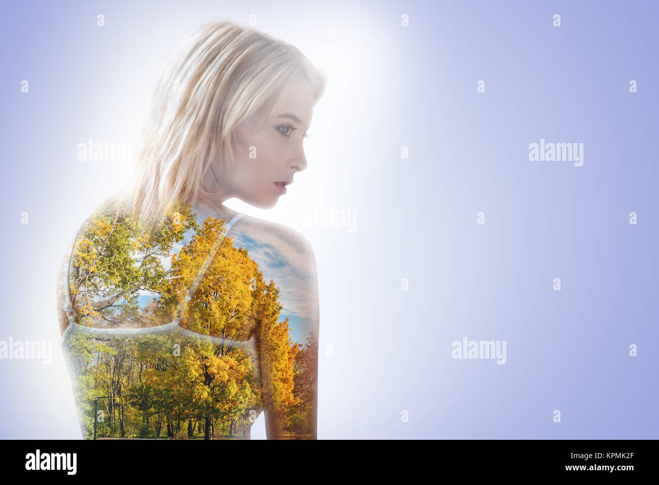Thoughtful nice woman thinking about nature Stock Photo - Alamy