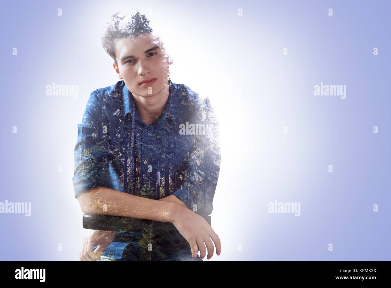 Handsome young man looking at you Stock Photo - Alamy