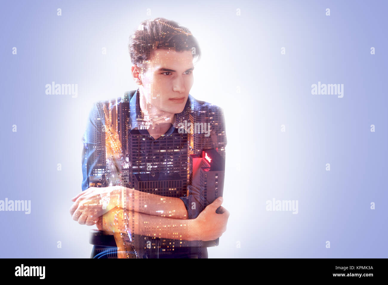 Nice good looking man holding himself Stock Photo - Alamy