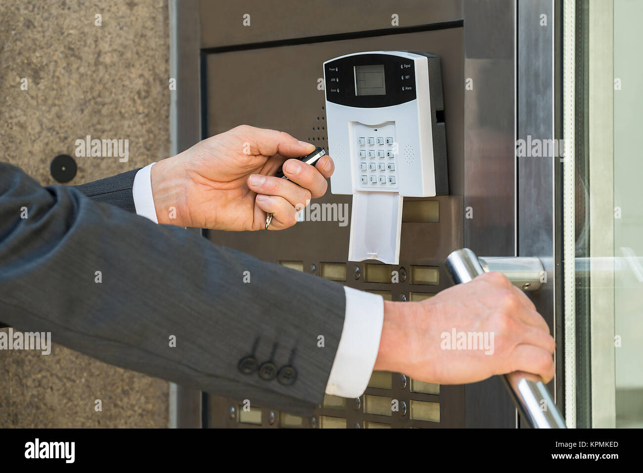 Businessperson Hand Operating Security System Stock Photo - Alamy