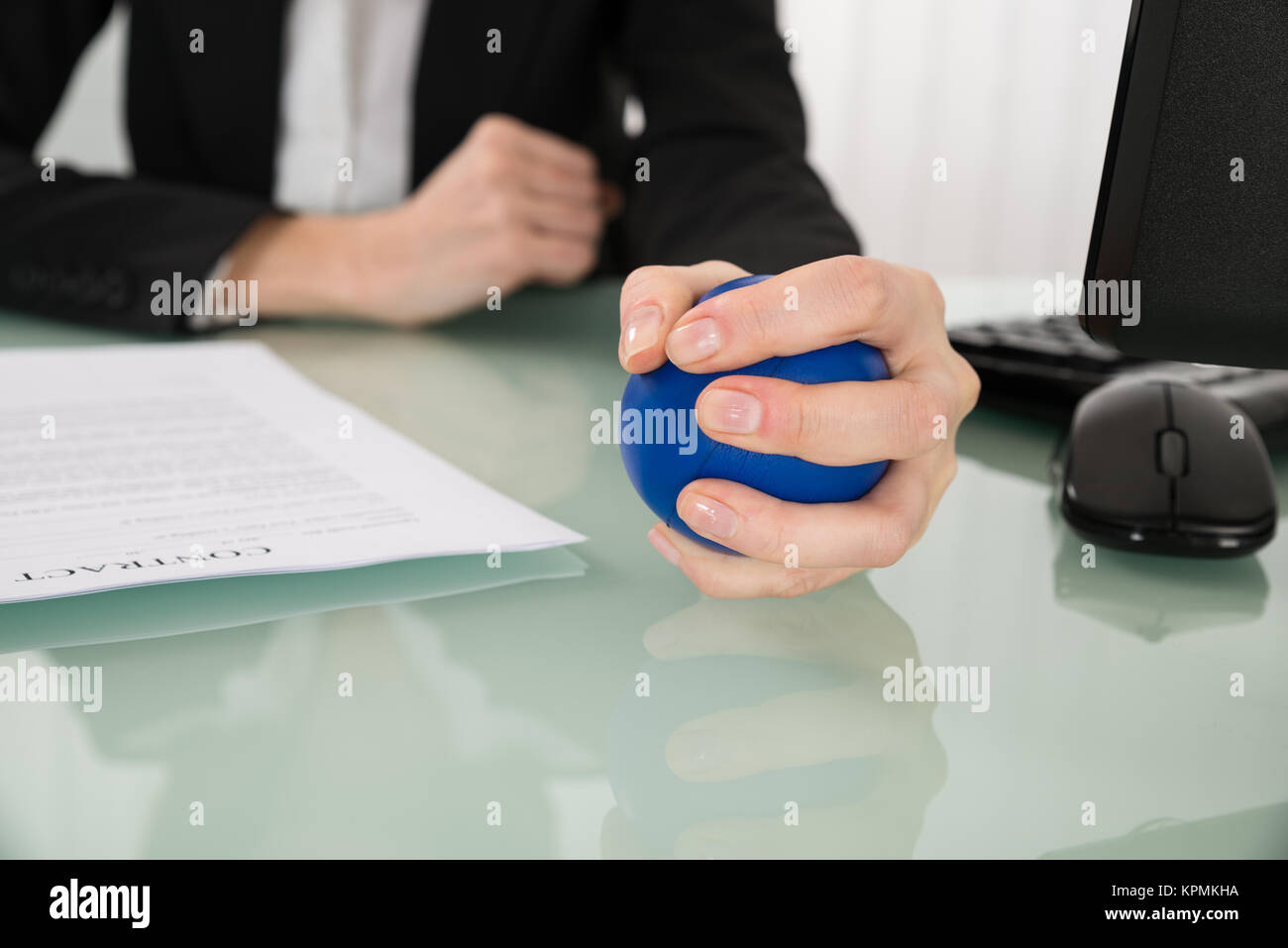 Close-up Of Businesswoman Pressing Stressball Stock Photo - Alamy