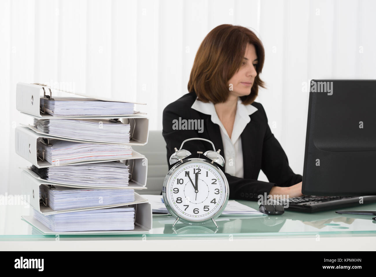 Woman, Office, Time Indication High Resolution Stock Photography and ...