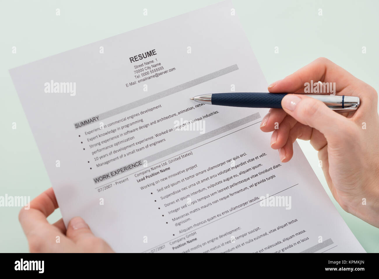 Person Hand Holding Resume Stock Photo - Alamy