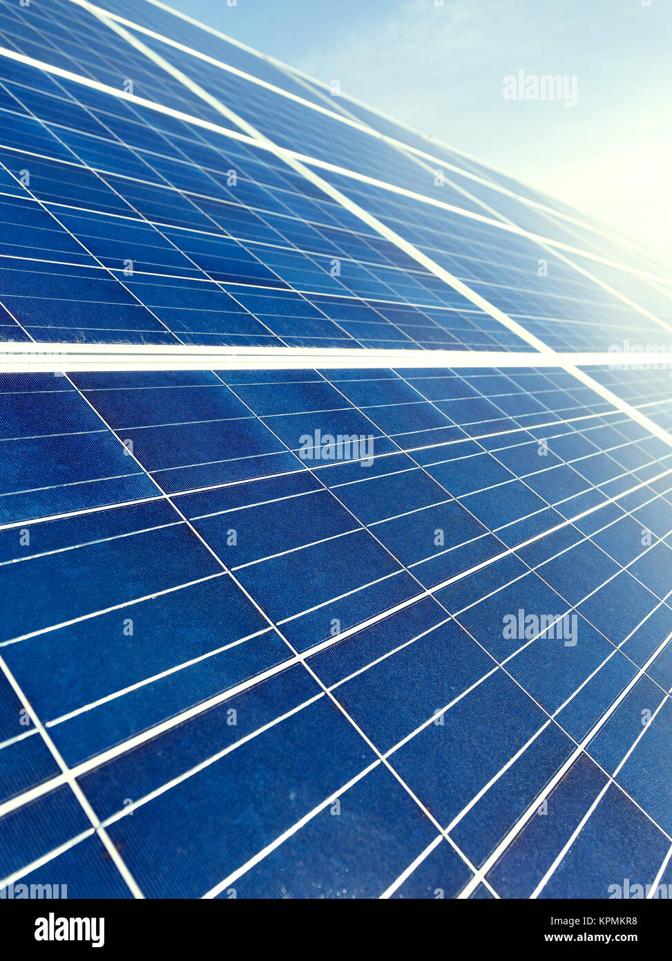 Solar panel texture under blue sky Stock Photo - Alamy