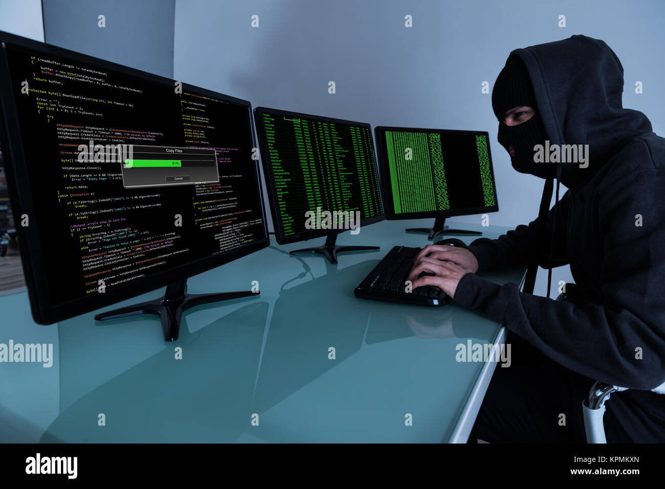 Hacker Stealing Data On Multiple Computers Stock Photo - Alamy