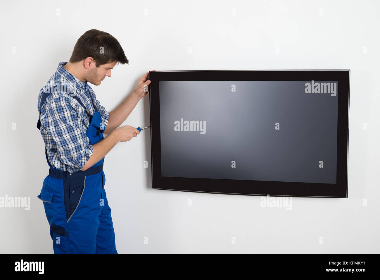 Male Technician Repairing Television Stock Photo - Alamy
