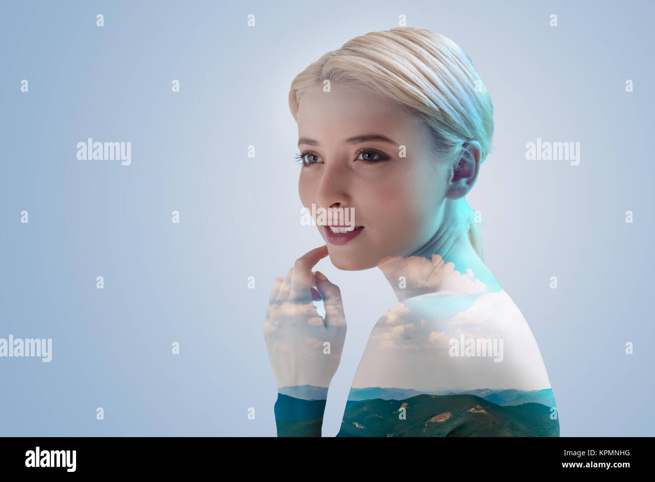 Positive minded girl dreaming and smiling Stock Photo - Alamy